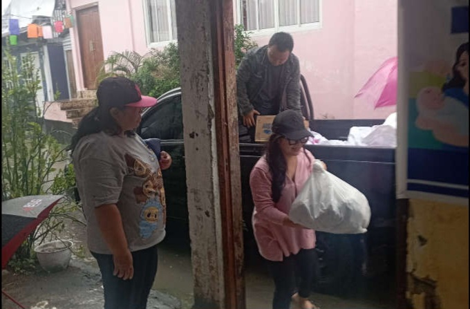 Diskominfo dan Disdukcapil Manado Salurkan Bantuan kepada Warga ...